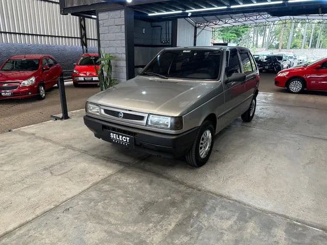 Fiat Uno Mille Fire 2002: um clássico econômico e versátil!